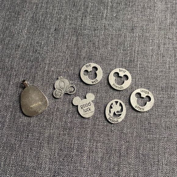 Disney | Other | Set Of 7 Disney Tokens Andor Disney Charms | Poshmark